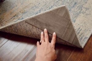How to Keep Rug Corners from Curling Up on Carpet? (Explained)